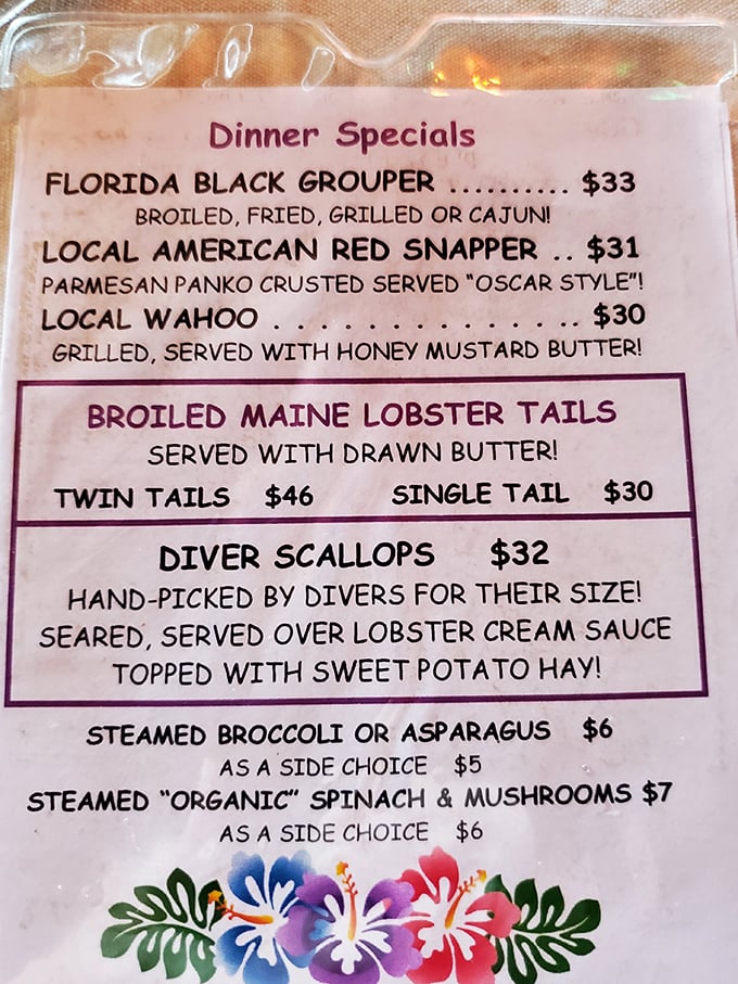 The menu reads like coastal poetry – local grouper, snapper, and those legendary Maine lobster tails that have Floridians plotting road trips to Vero Beach.