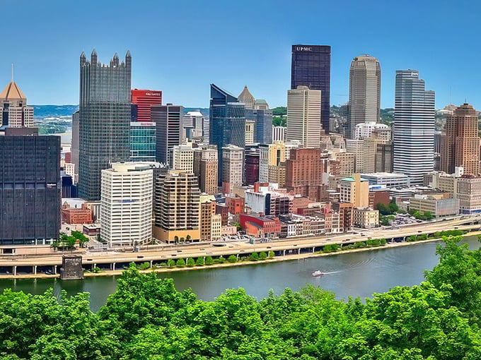 From up here, Pittsburgh's skyline looks like someone arranged a perfect architectural symphony along the riverbank.