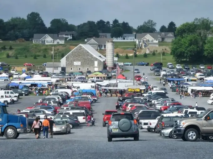 From this aerial view, Green Dragon's parking lot resembles a small city. The stone barn in the background reminds us of the market's rural Pennsylvania roots.