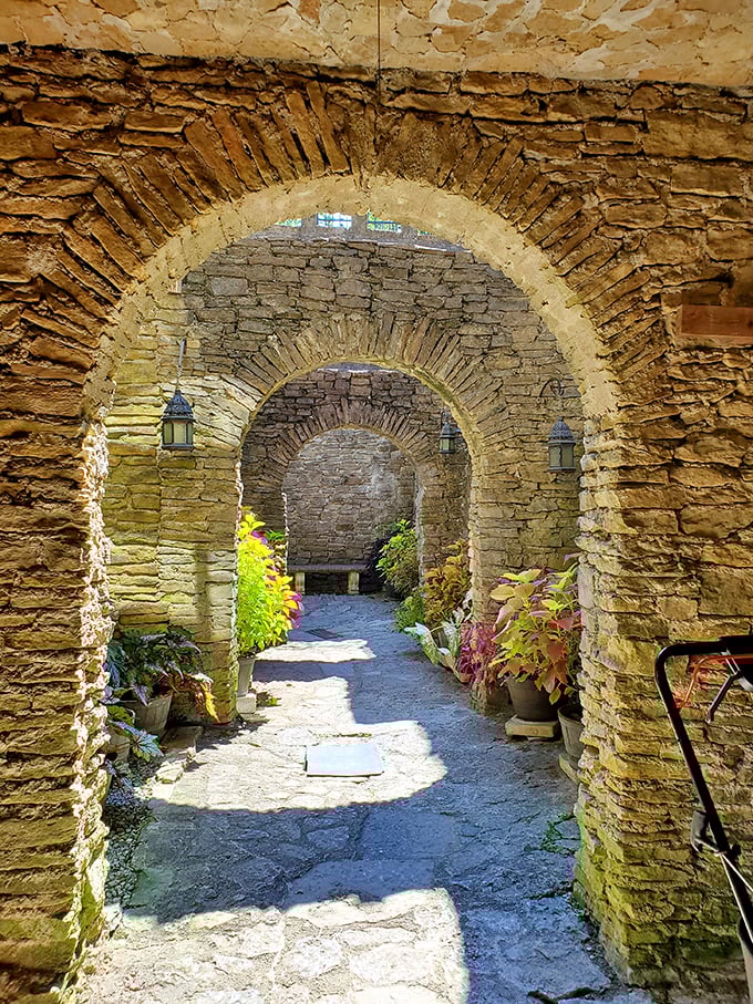 Sunlight streams through these perfectly crafted stone archways, creating a corridor that feels straight out of Game of Thrones—minus the dragons.