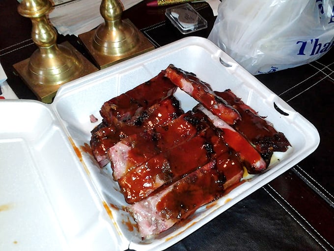These glistening ribs aren't just food; they're edible artwork. The sauce-lacquered surface catches light like stained glass, promising a religious experience for your taste buds.