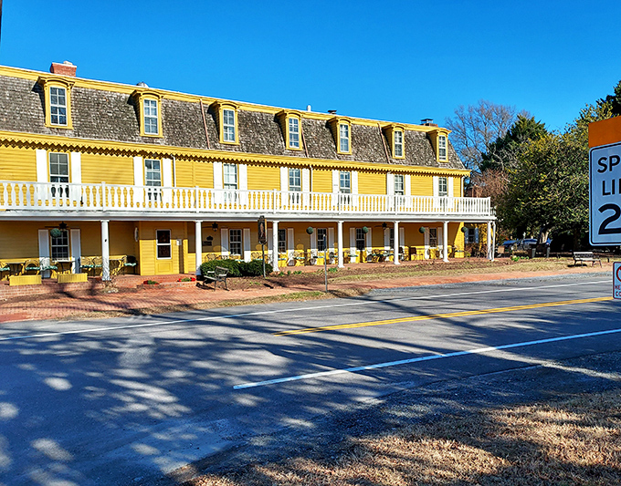 The Robert Morris Inn glows golden in the sunshine, a colonial masterpiece that's witnessed more American history than your high school textbook.