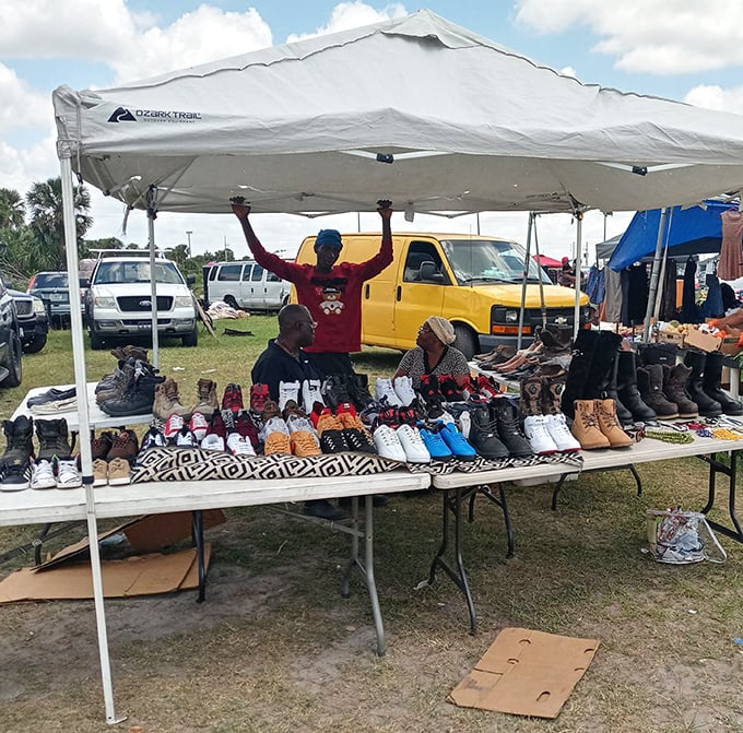 Sneaker heaven awaits! This vendor's impressive display would make any footwear enthusiast consider a second mortgage for "just one more pair."