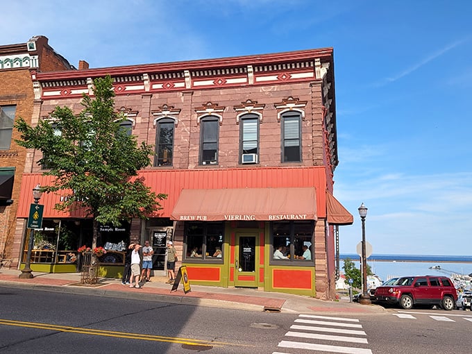 The Vierling's colorful façade isn't just Instagram-worthy—it's your gateway to house-brewed beers and Lake Superior whitefish just steps from the harbor.