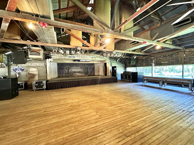 Empty now, but just wait—this dance floor has hosted more two-stepping couples and spilled beer than anywhere else in Texas. The ghosts of past performances linger in every board.