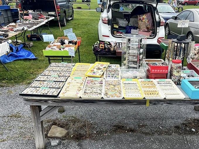 Jewelry displays that would make a magpie jealous spread across weathered tables – each tray a constellation of potential heirlooms waiting for new wrists and necks.