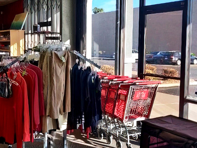 The gateway to adventure—red shopping carts stand ready for your treasure-hunting expedition through aisles of pre-loved possibilities.