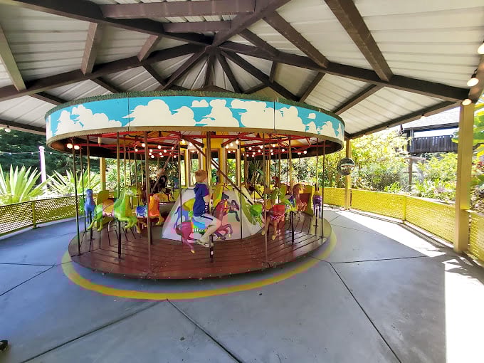 This vintage carousel doesn't need virtual reality or smartphone apps—just the timeless joy of going round and round on hand-painted creatures.