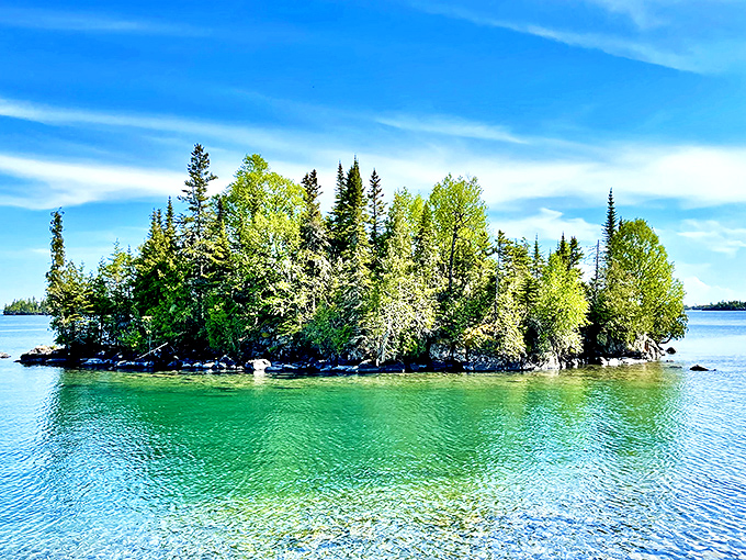 A tiny forested island that looks like it was plucked straight from a fairy tale—just add a friendly troll and you're set.
