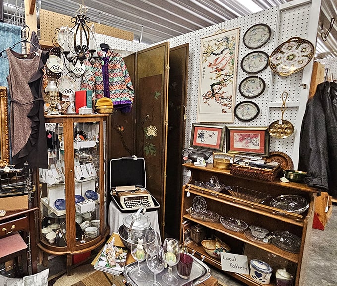 Every shelf tells a story here—from vintage typewriters to delicate china, it's like your grandmother's attic got organized... sort of.