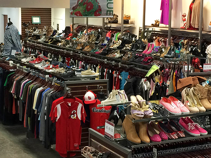Cardinals gear nestled among designer finds—proof that Midwest practicality and style can peacefully coexist.