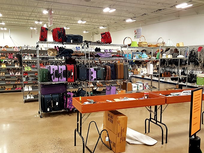 Not your grandmother's thrift store! Meticulously organized shelves showcase luggage, shoes, and accessories that might have you questioning if "used" is the right word.