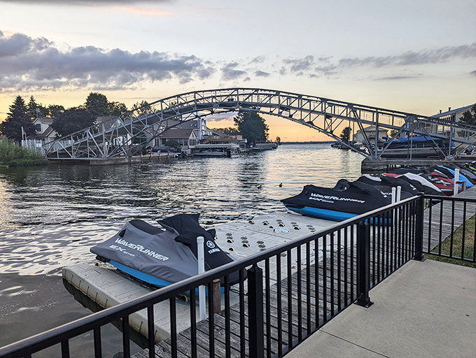 That iconic arched bridge at sunset isn't just Instagram bait—it's a portal to lake adventures that don't require a passport or currency exchange.