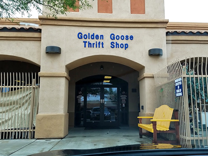 The welcoming entrance, complete with a cheerful yellow bench, serves as a portal to a world where one person's castoffs become another's treasures.
