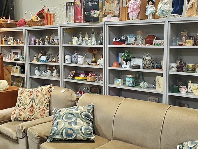The figurine section could populate a tiny ceramic village, while that neutral sofa waits patiently to become the centerpiece of someone's living room makeover.