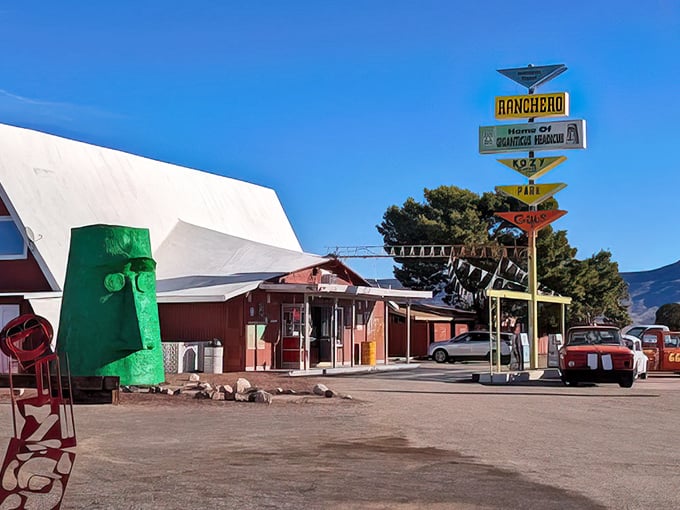 The colorful signage points to various attractions, but let's be honest – you came for the big green guy who never blinks.