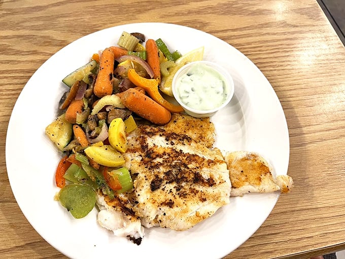 Perfectly grilled fish meets colorful vegetables in a plate that screams "Florida sunshine." This isn't just dinner—it's edible artwork with a side of tartar sauce.