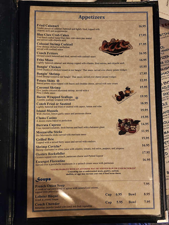The menu reads like a love letter to the ocean—Blue Claw Crab Cakes, Coconut Shrimp, and Island Mussels tempt you before you've even ordered a drink.