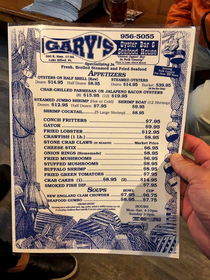 This menu isn't just a list—it's a maritime treasure map. The blue nautical border practically whispers, "Trust me, order the oysters."