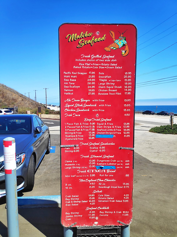 The iconic red menu board—a roadside beacon of deliciousness that's caused more spontaneous U-turns than a celebrity sighting on PCH.