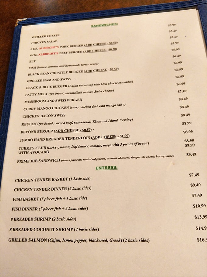 A menu that reads like a love letter to comfort food classics. The prime rib sandwich description alone might be worth framing.