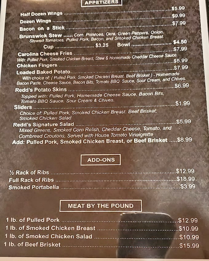 This menu isn't just a list of options—it's a roadmap to happiness. The "Meat by the Pound" section is where dreams are made.