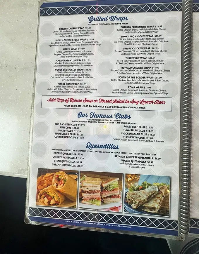 This isn't just a menu – it's a roadmap to happiness, featuring wraps that redefine portable perfection.