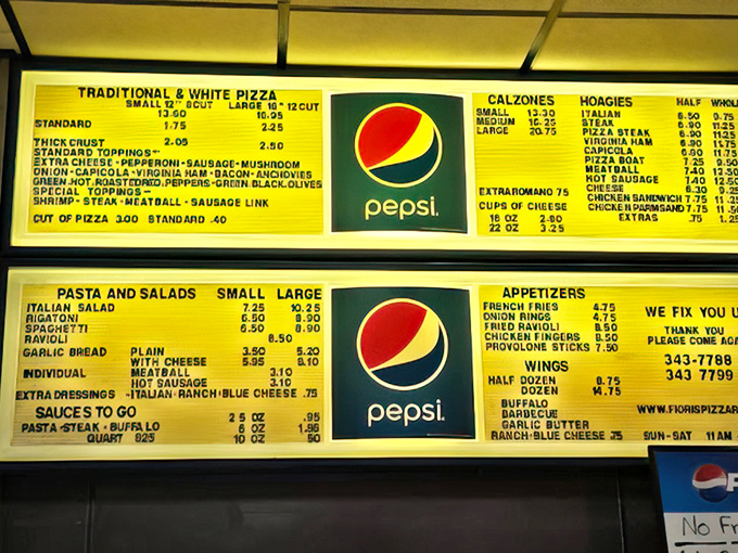 The backlit menu board—a time capsule of Italian-American classics—hasn't changed in decades because perfection needs no updates.