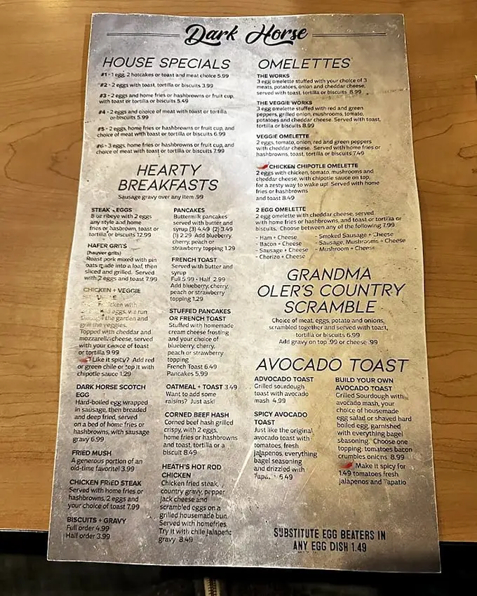 This menu isn't just a list of options—it's a roadmap to breakfast nirvana with gems like Grandma Oler's Country Scramble.