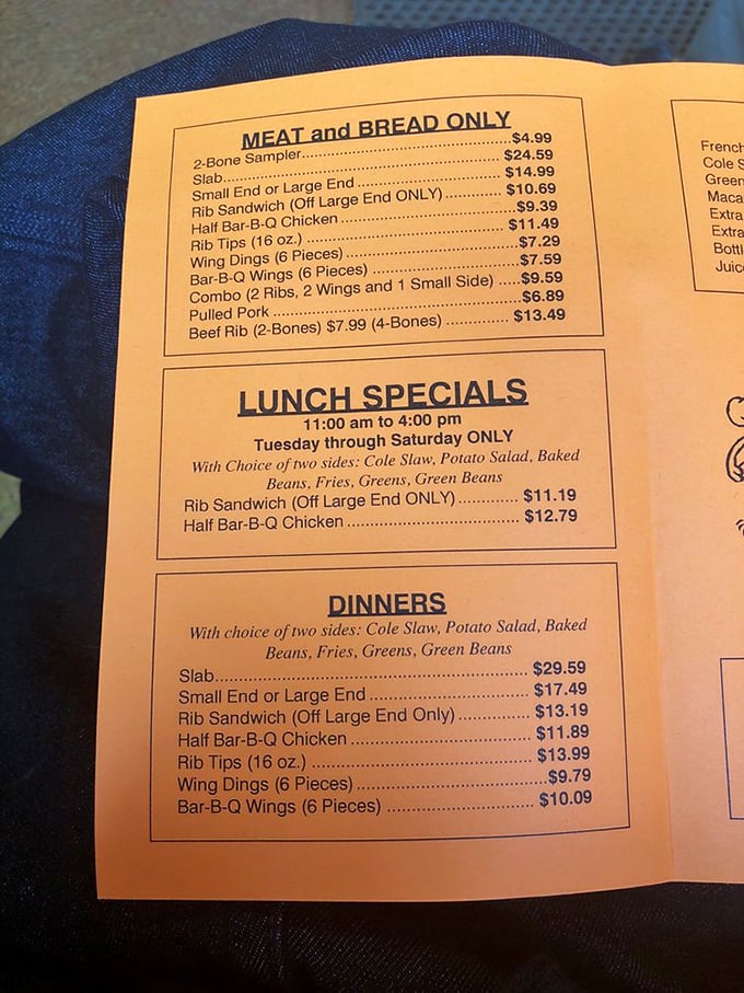 That bright orange menu is like a treasure map where X marks every delicious spot. The real challenge? Deciding what not to order.