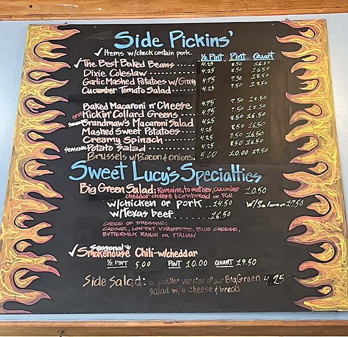 The flame-bordered menu board tells you everything you need to know—this place takes its "Side Pickins'" as seriously as the main event.