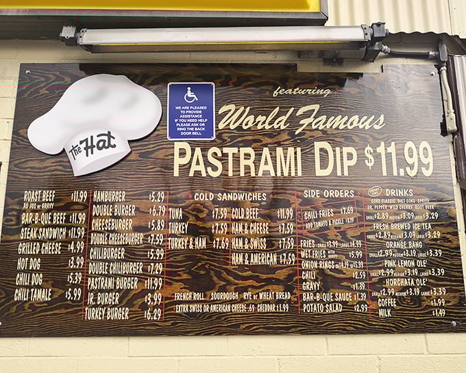 This menu board isn't just a list—it's a treasure map to culinary happiness. The World Famous Pastrami Dip is the X that marks the spot.