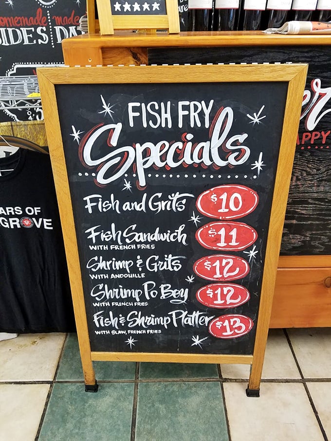 The chalkboard menu reads like a love letter to Southern seafood classics. Fish and grits might just be the most beautiful three-word phrase in English.