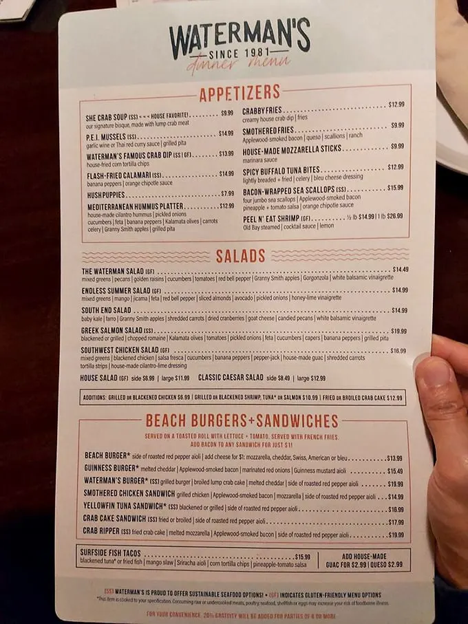 A menu that reads like a love letter to the Chesapeake Bay, with those legendary bacon-wrapped scallops front and center where they belong.