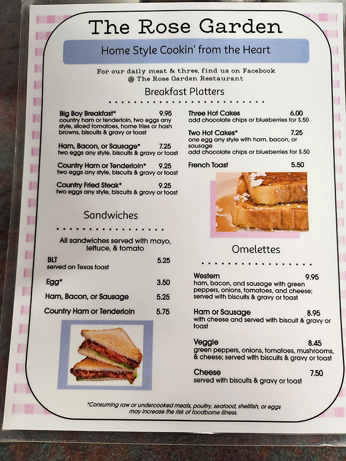 This menu isn't trying to impress with fancy fonts—it's making promises of breakfast bliss with classics like the "Big Boy Breakfast" and country fried steak.