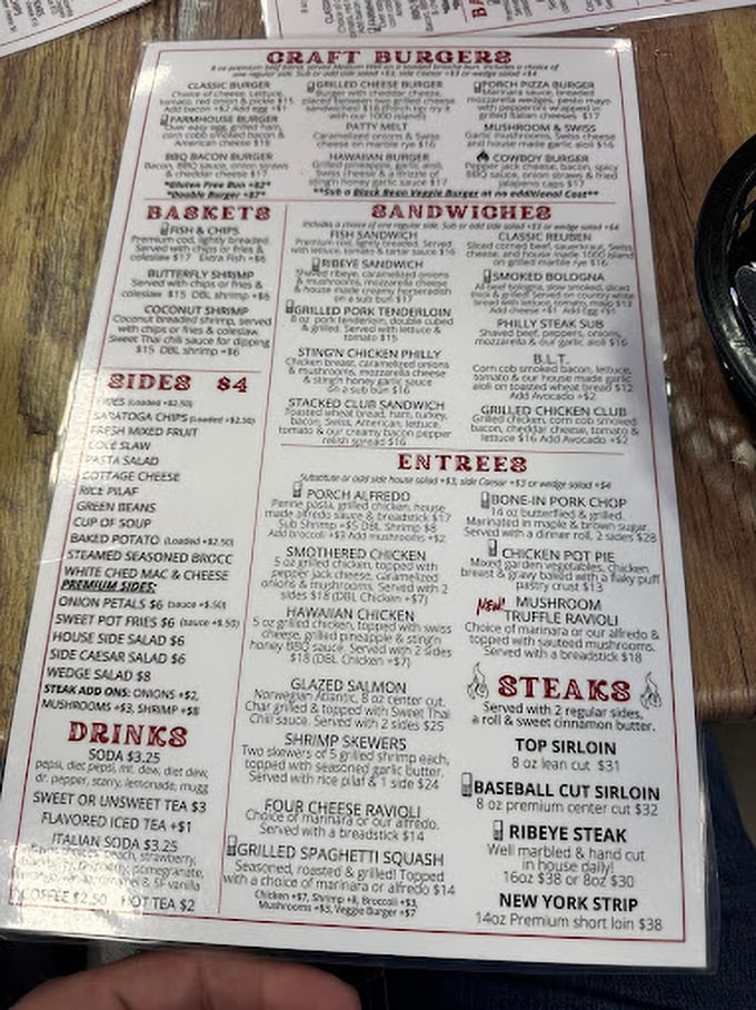 A menu that reads like a love letter to American comfort food, featuring everything from craft burgers to hand-cut steaks.