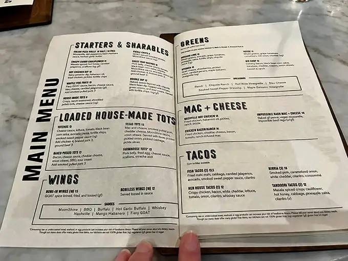 This menu isn't just a list of food—it's a roadmap to happiness. The "Loaded House-Made Tots" section alone deserves its own ZIP code.