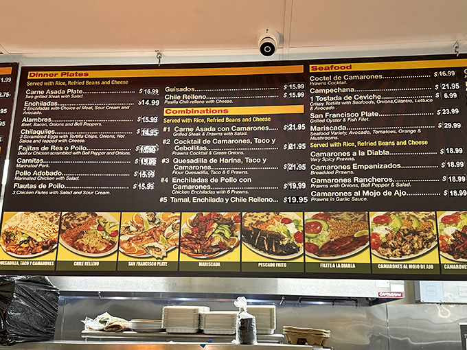 The menu board – a glorious roadmap to flavor town where indecision is just part of the adventure.