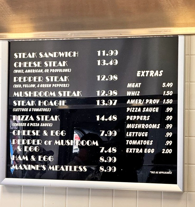 The menu board at Jim's keeps it gloriously simple—when you've perfected the cheesesteak, why complicate things with unnecessary options?