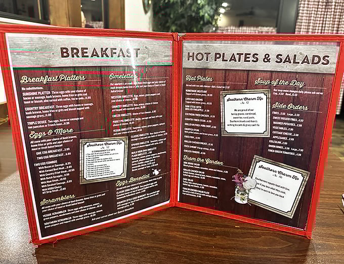 Red menus hold the secrets to breakfast bliss – each page promising another reason to loosen your belt.