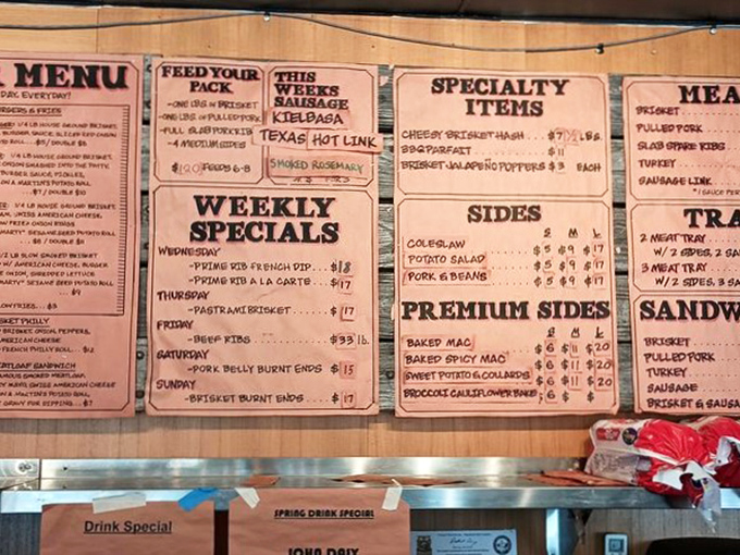 This menu board isn't just a list—it's a roadmap to happiness. Weekly specials like "Pork Belly Burnt Ends" are basically permission slips for culinary joy.