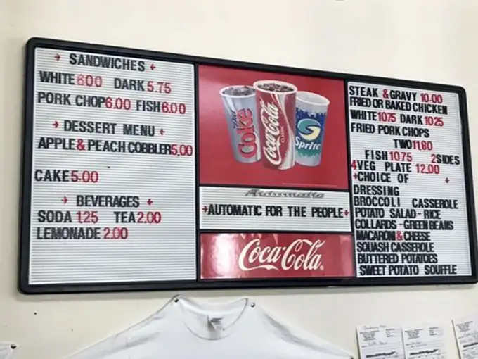 When your menu board features "Automatic for the People," you know you're in for authentic Athens hospitality.
