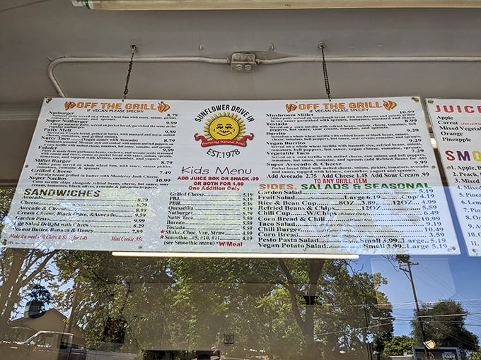This menu board isn't just a list—it's a roadmap to happiness. The smiling sun logo promises that even your wallet will leave satisfied.