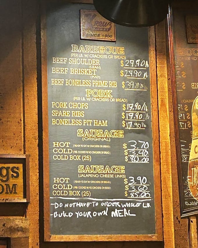 The chalkboard menu at Kreuz—a minimalist poem to meat. No fancy descriptions needed when your brisket has been speaking for itself for generations.