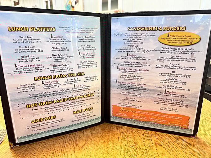 This menu isn't trying to reinvent breakfast—it's perfecting it. Each laminated page promises classics executed with the kind of care that makes you want to order everything.