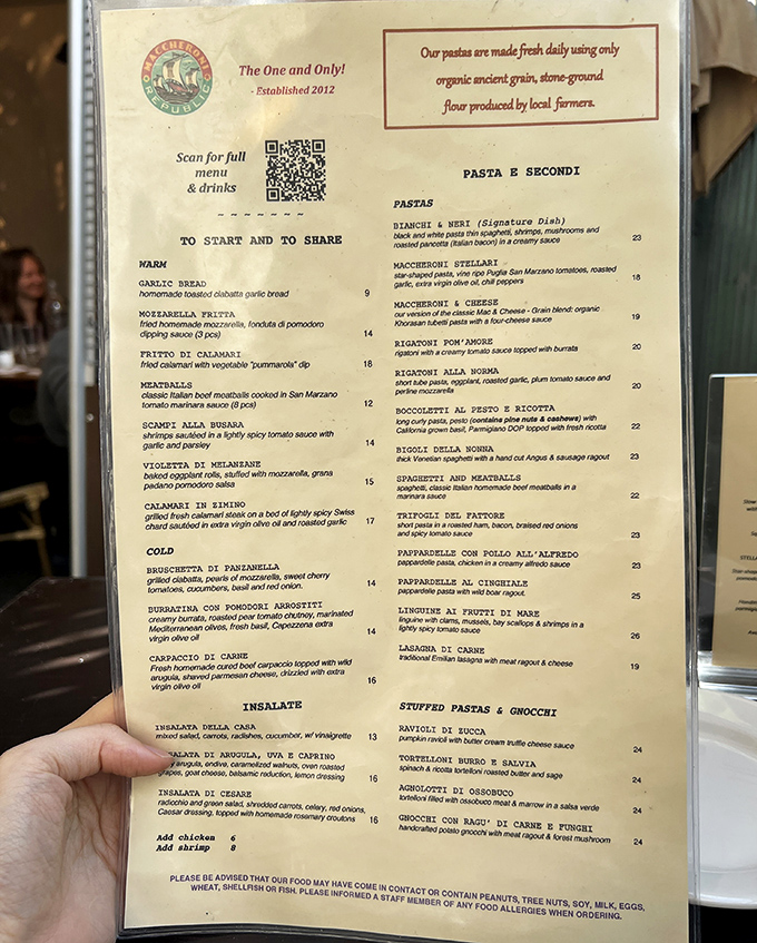 A menu that reads like poetry for pasta lovers. Notice how they don't waste precious space on salad descriptions? Priorities, people!