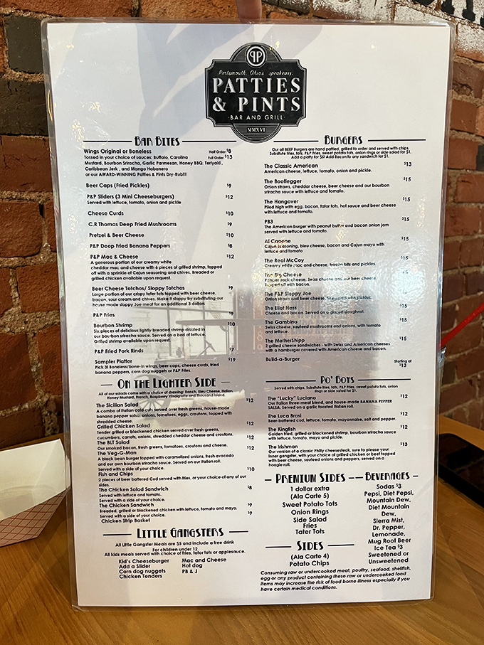 The menu that launched a thousand cravings. Each burger name is like a siren call – "The Hangover" practically dares you to indulge your wildest comfort food fantasies.