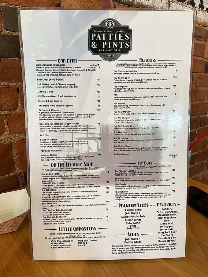 The menu that launched a thousand cravings. Each burger name is like a siren call – "The Hangover" practically dares you to indulge your wildest comfort food fantasies.