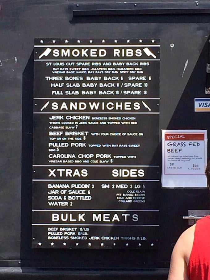 A menu board that cuts straight to the chase—no flowery descriptions needed when your meat speaks volumes. The star? That jerk chicken calling your name.