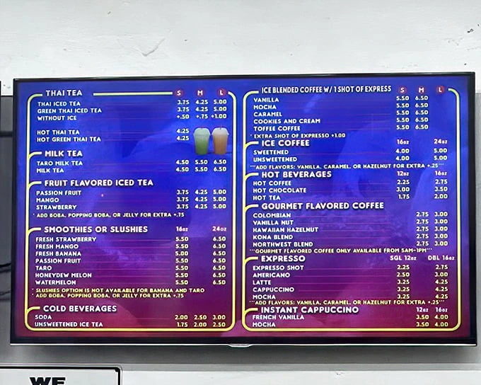 This menu board isn't just a list—it's a roadmap to happiness with Thai tea options that would make Bangkok proud.